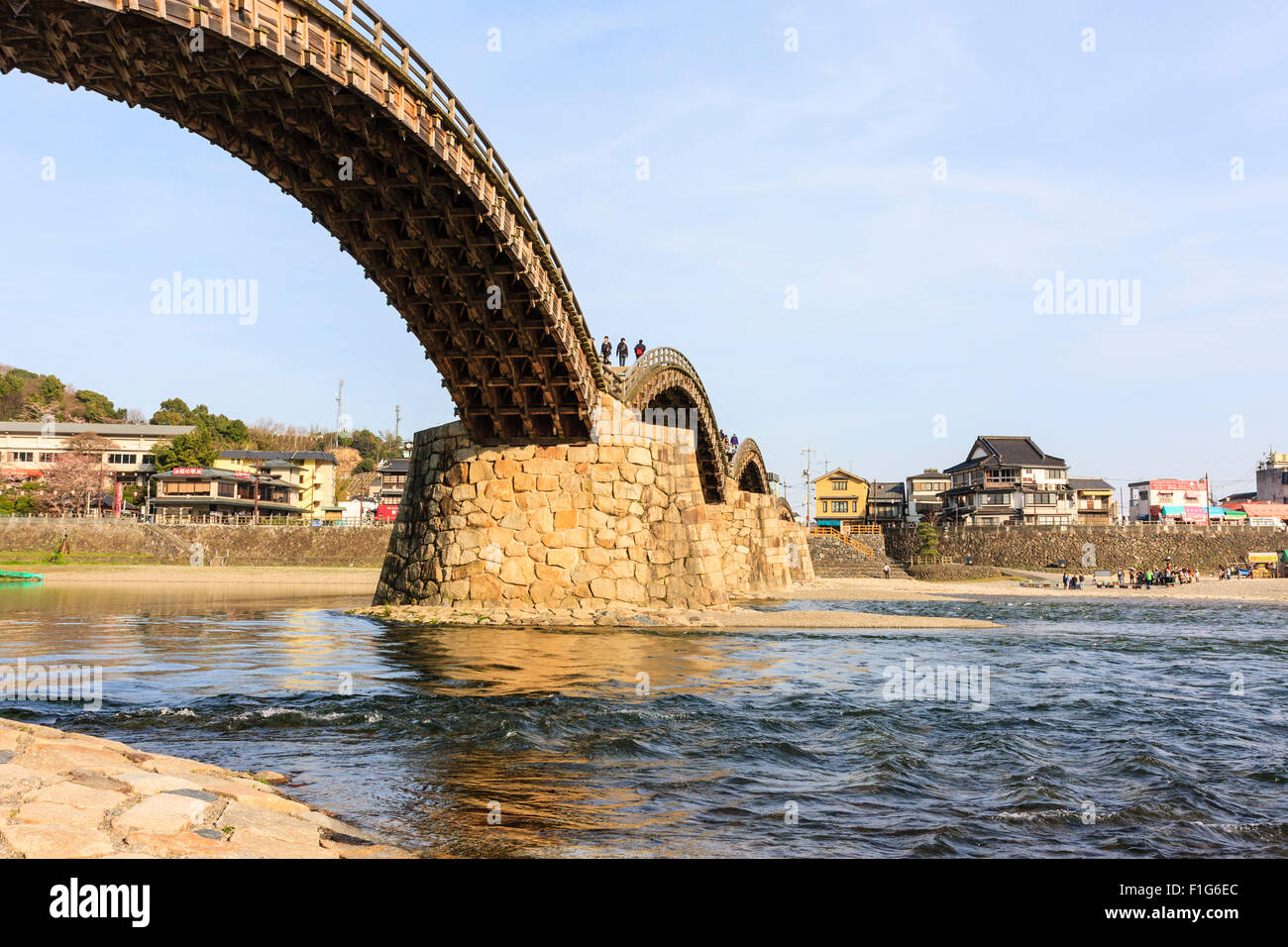 Iwakuni, Japan. The multi-arched wooden Kintaikyo bridge, with people ...