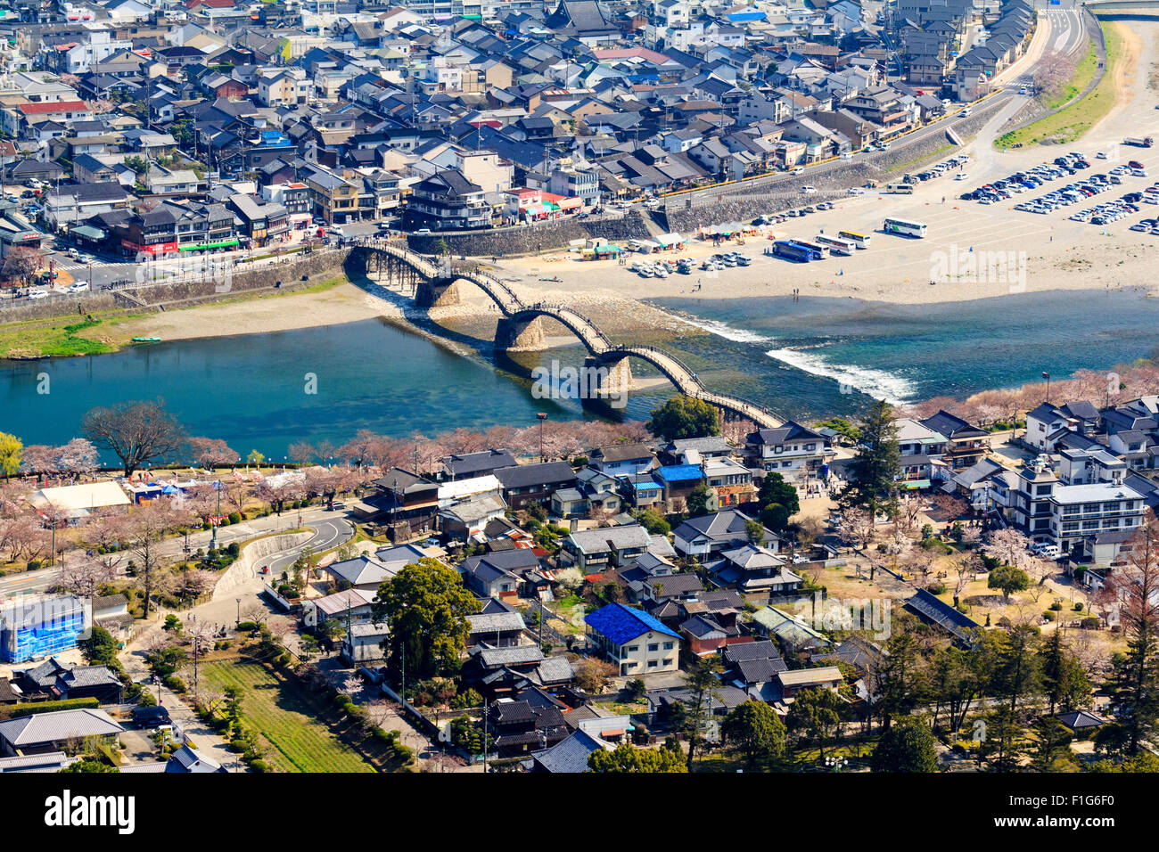 Iwakuni, Japan. The multi-arched wooden Kintaikyo bridge, with people ...