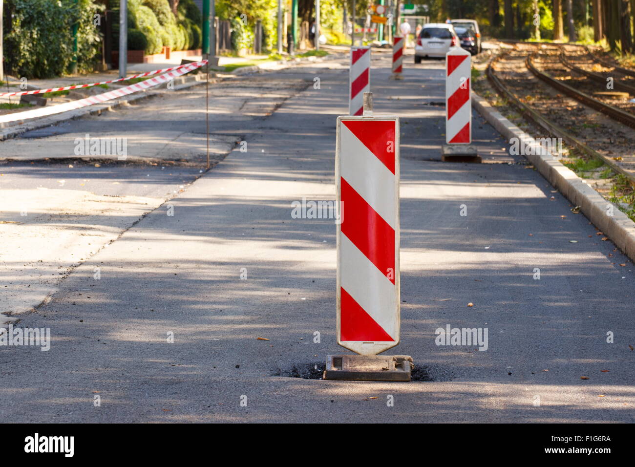 Road sign informing about danger during pavement repair, road ...