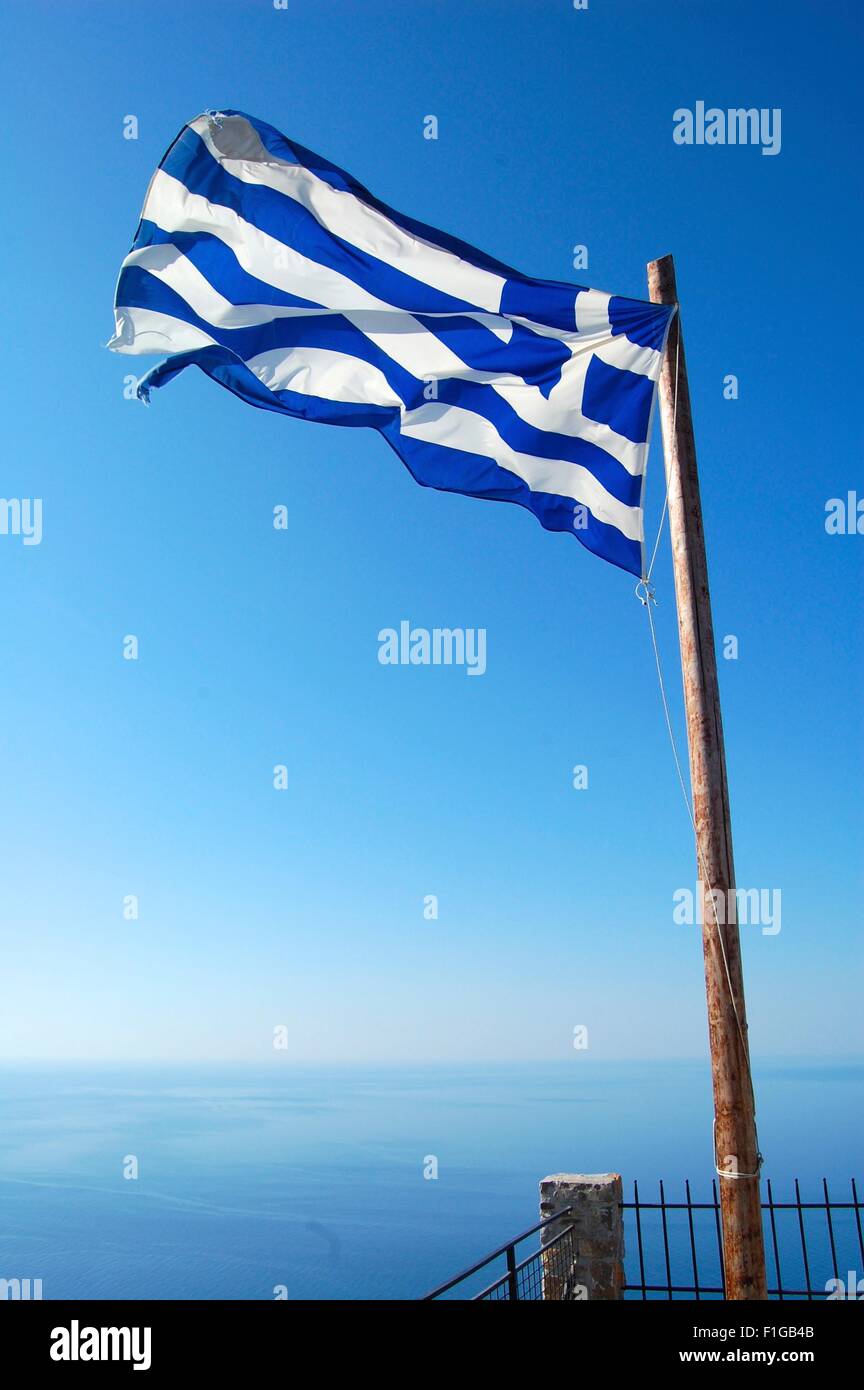 Greek flag flying against a clear blue sky Stock Photo - Alamy