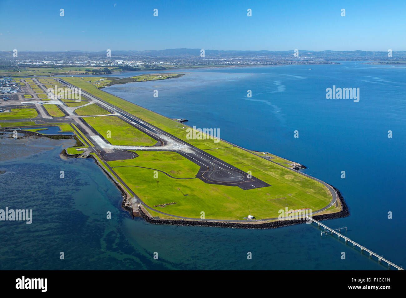 Main runway at Auckland Airport, and Manukau Harbour, Auckland, North ...