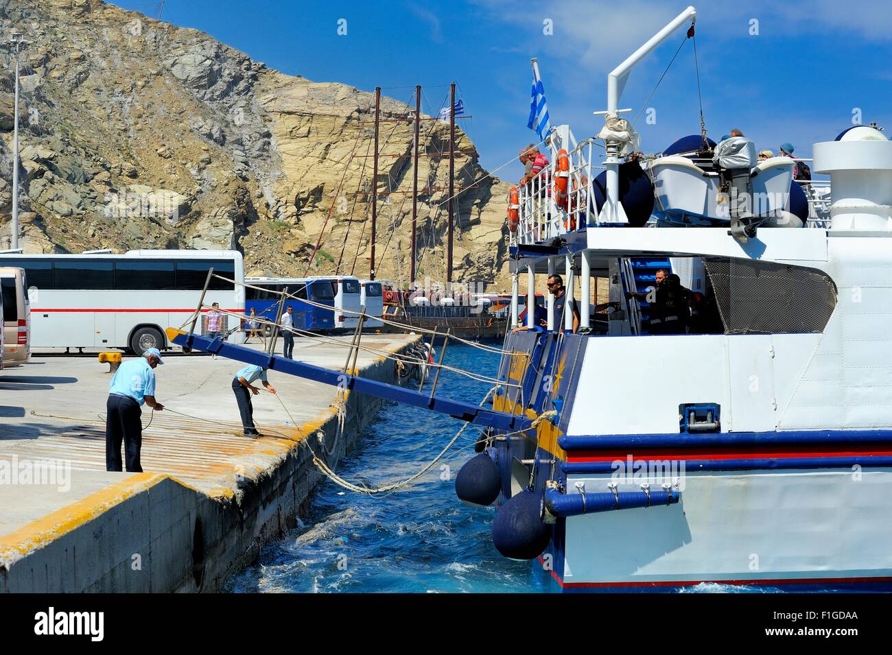 A ferry arriving in the port Ormos Athinios Santorini Greece Stock ...