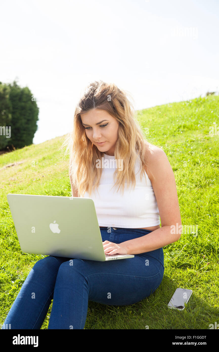 Girl studying using apple laptop hi-res stock photography and images ...