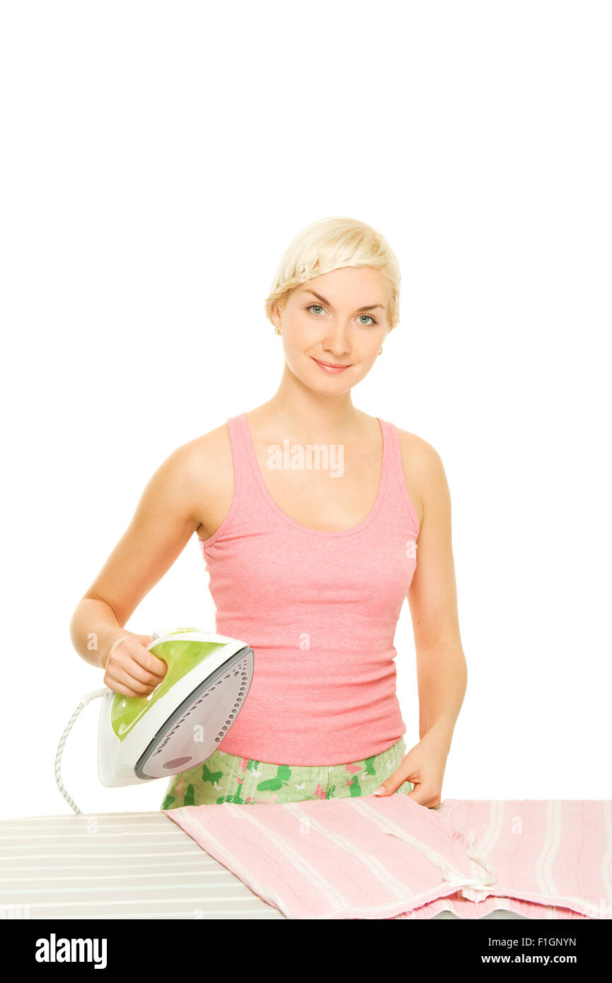 Beautiful woman ironing clothes. Isolated on white background Stock ...