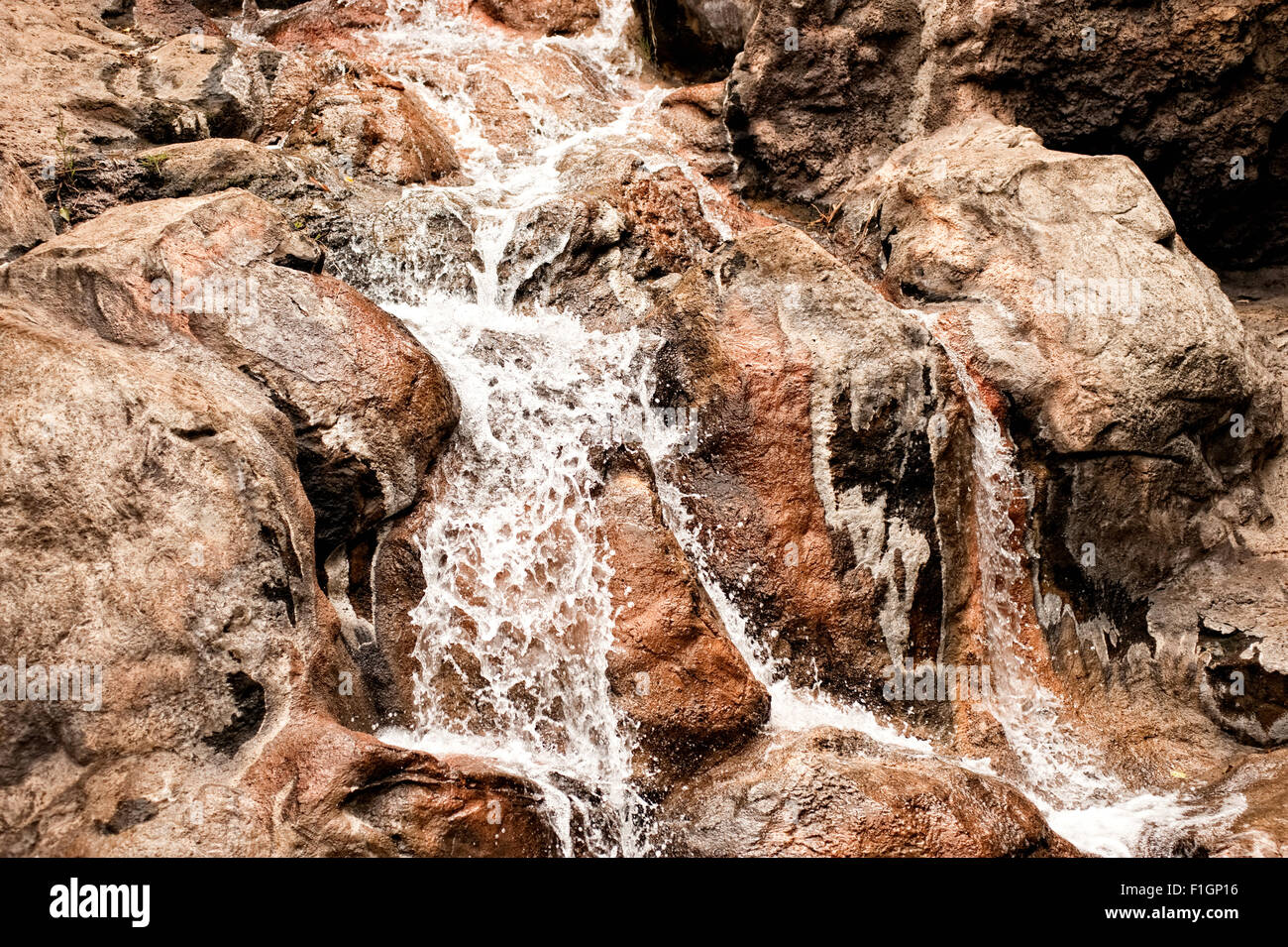 waterfall in the stones Stock Photo - Alamy