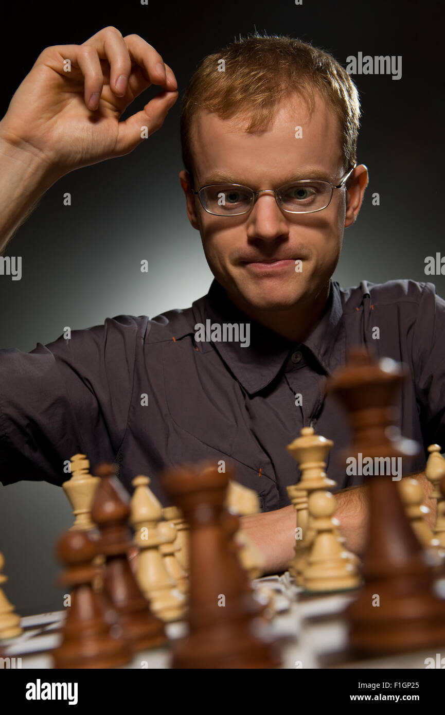 Chess master making smart move Stock Photo - Alamy