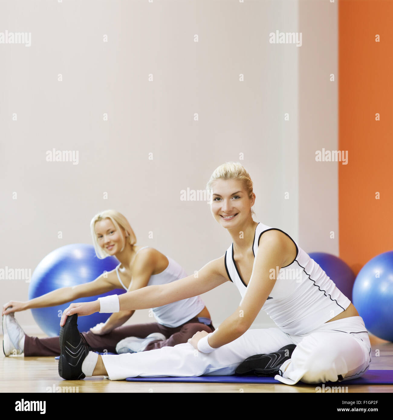 Group of people doing stretching exercise Stock Photo - Alamy