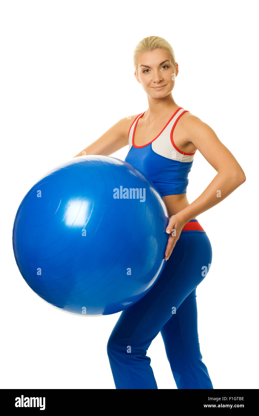 Beautiful fitness trainer with a ball Stock Photo - Alamy