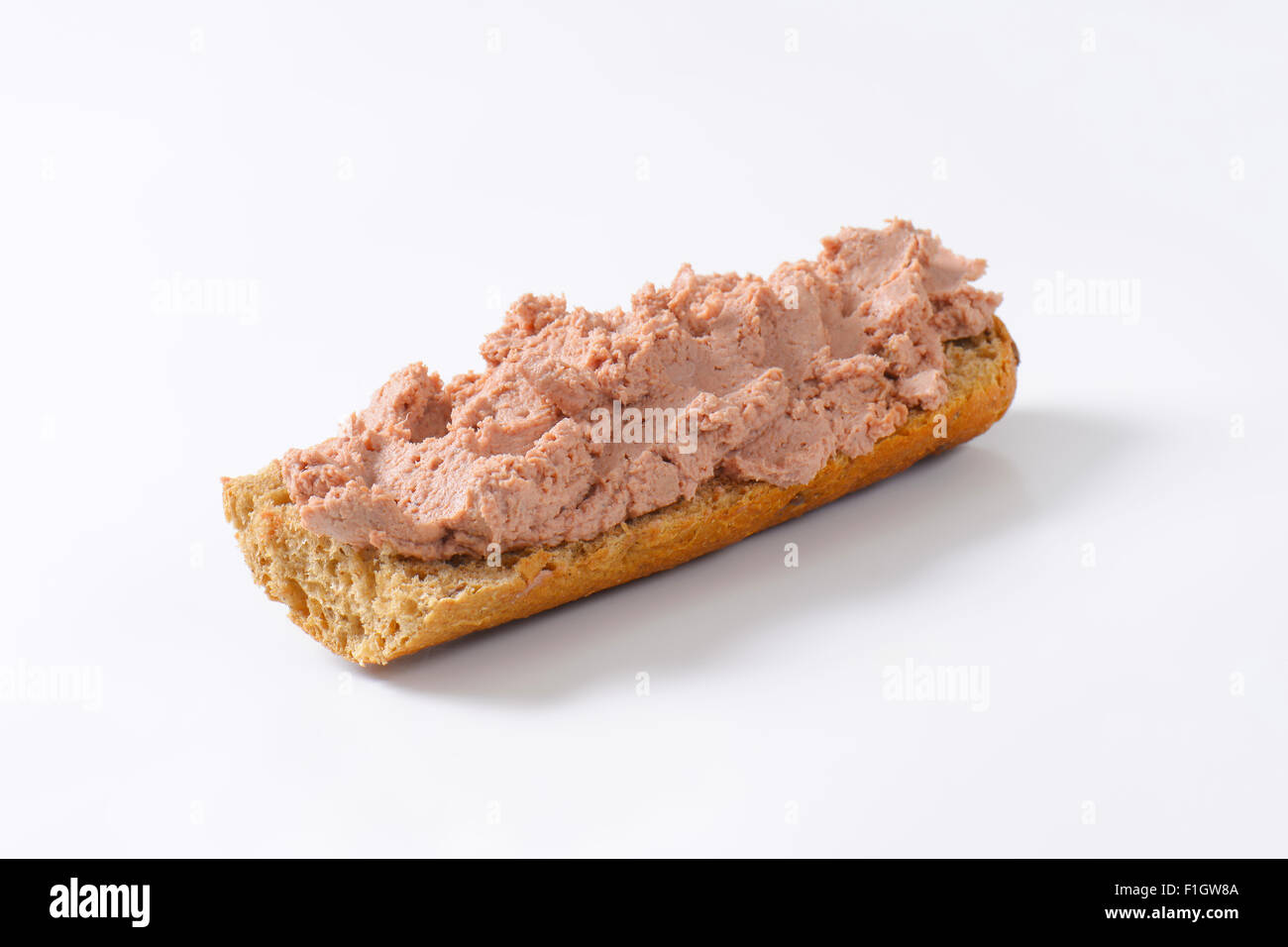 fresh baguette with pate on white background Stock Photo - Alamy
