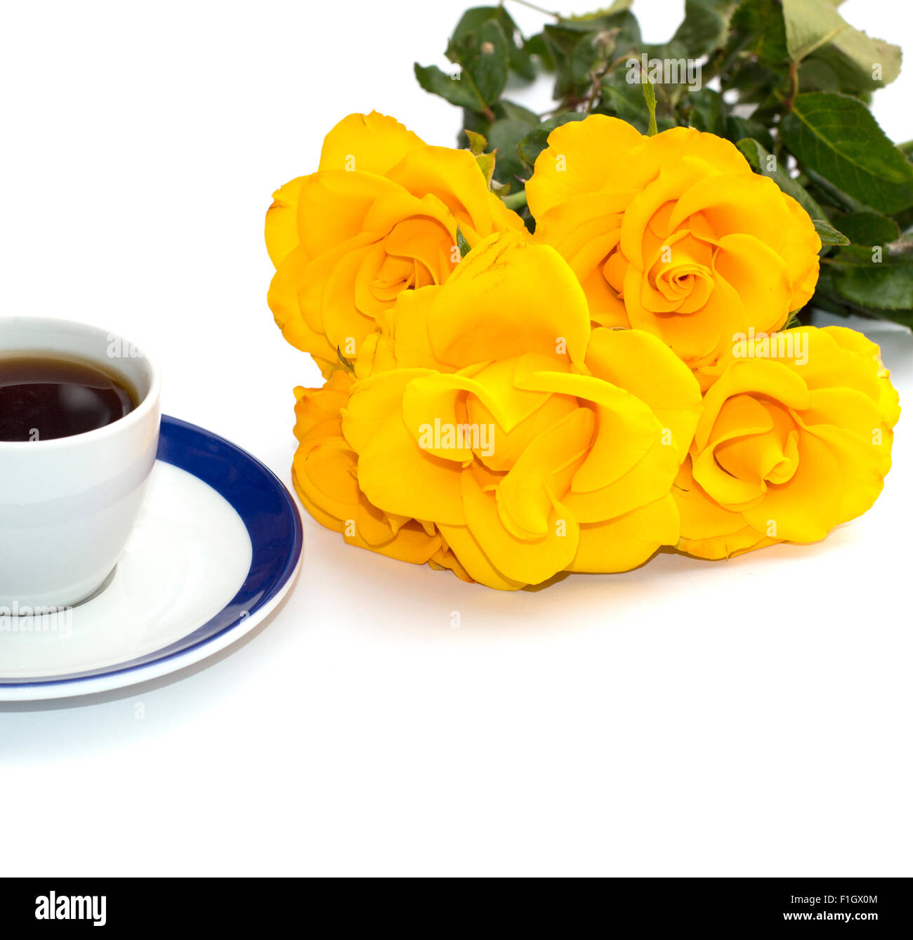 cup of coffee and yellow flowers, isolate Stock Photo - Alamy