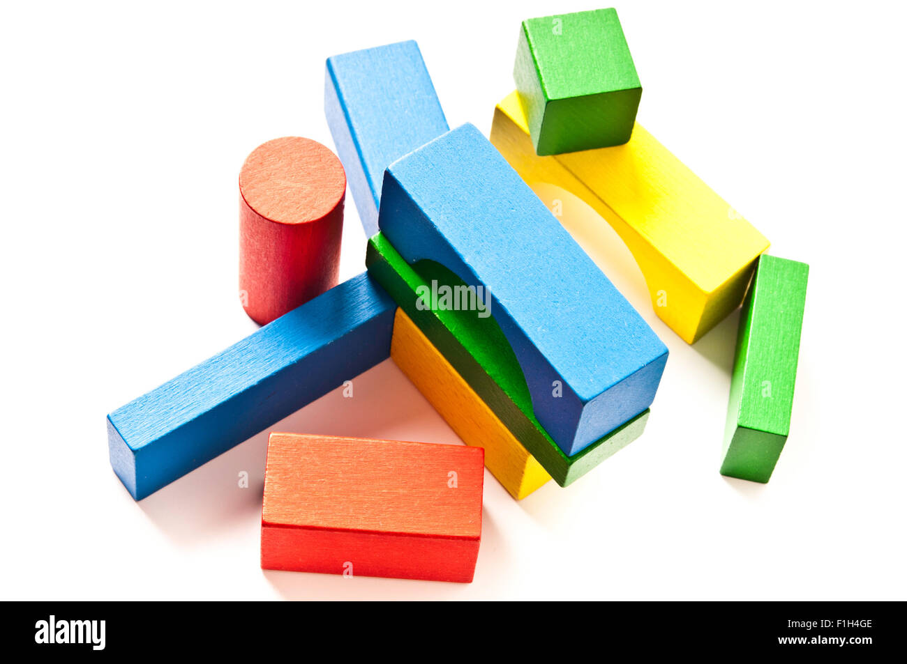 colourful wooden toy construction pieces Stock Photo - Alamy