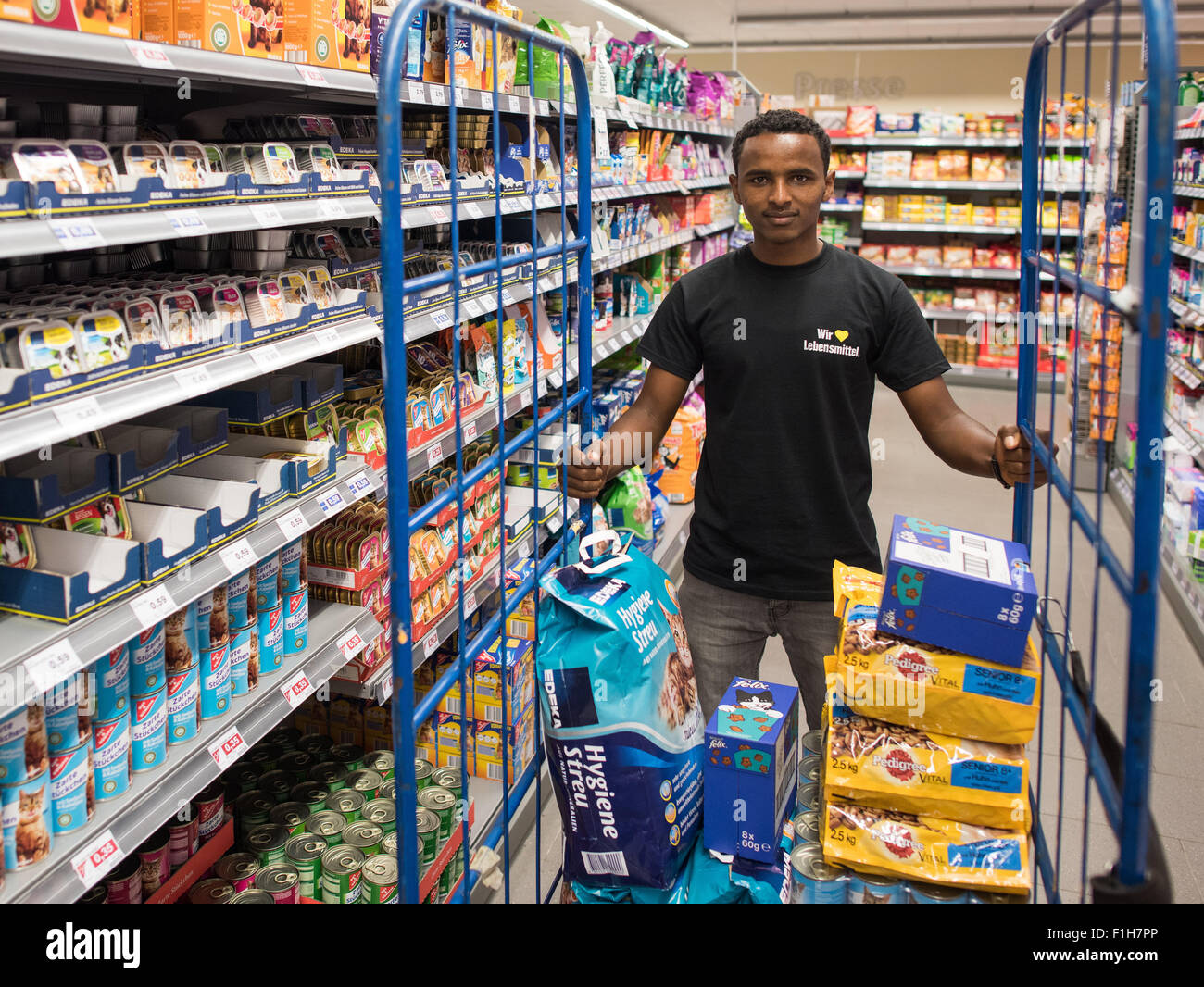 Briesen, Germany. 12th Aug, 2015. Haben (19) a refugee from Eritrea is ...