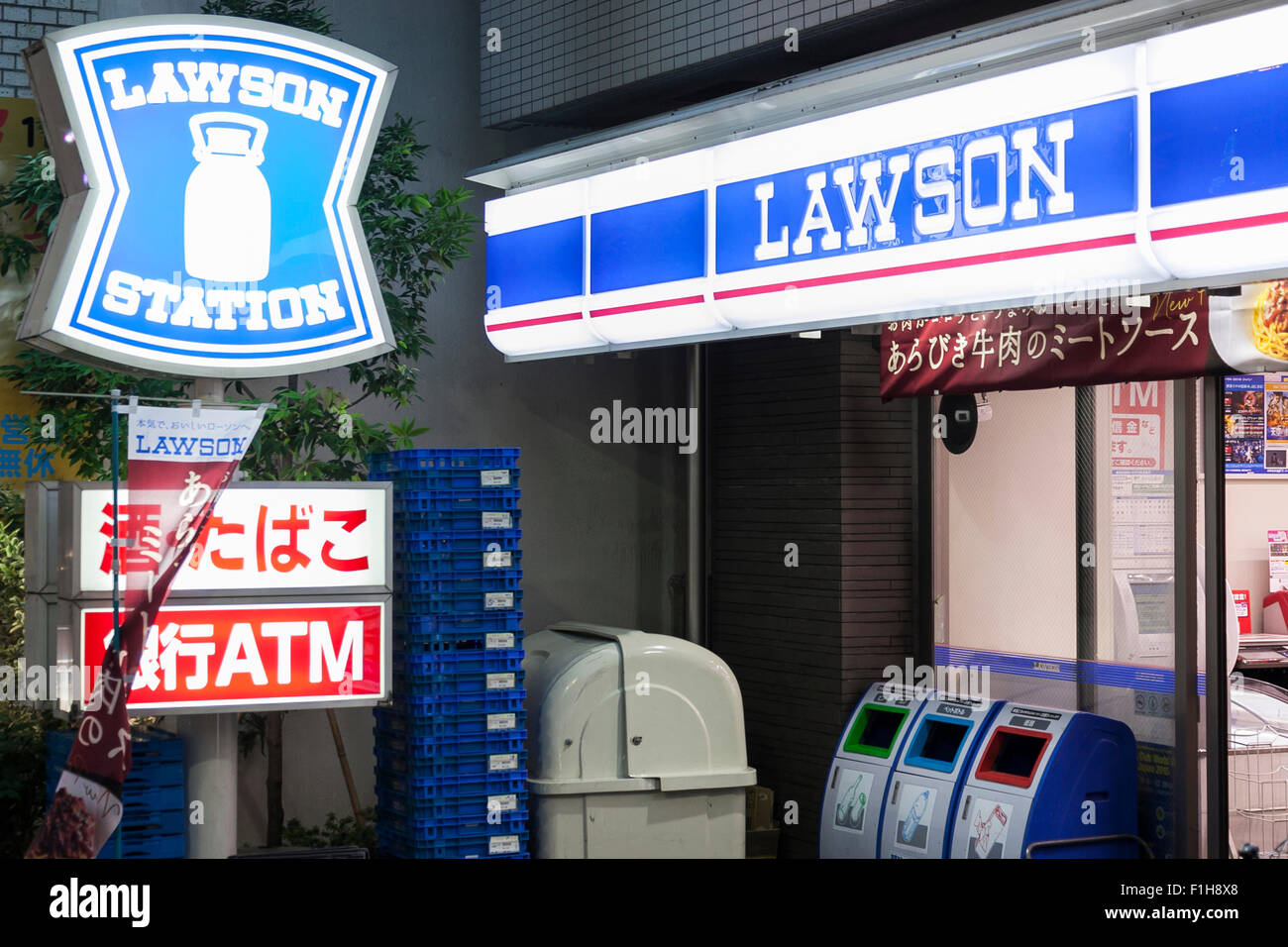 Lawson signboards on display at the entrance of one of its convenience ...