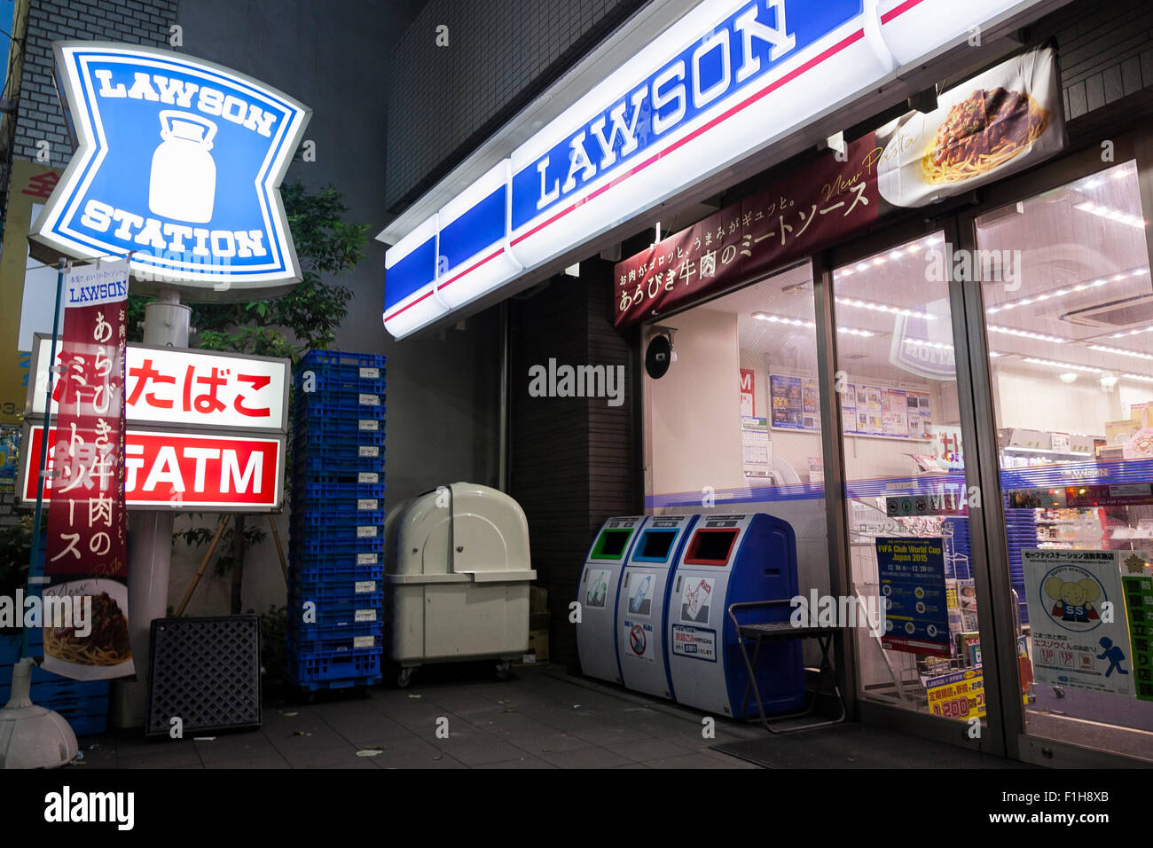 Lawson signboards on display at the entrance of one of its convenience ...