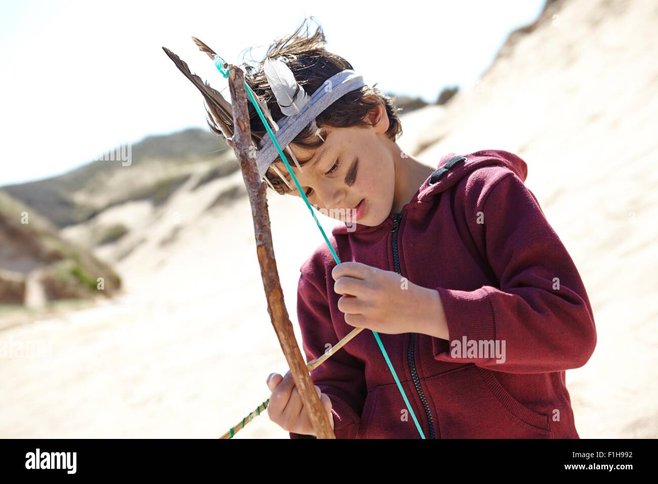 Playing arrow and bow hi-res stock photography and images - Alamy