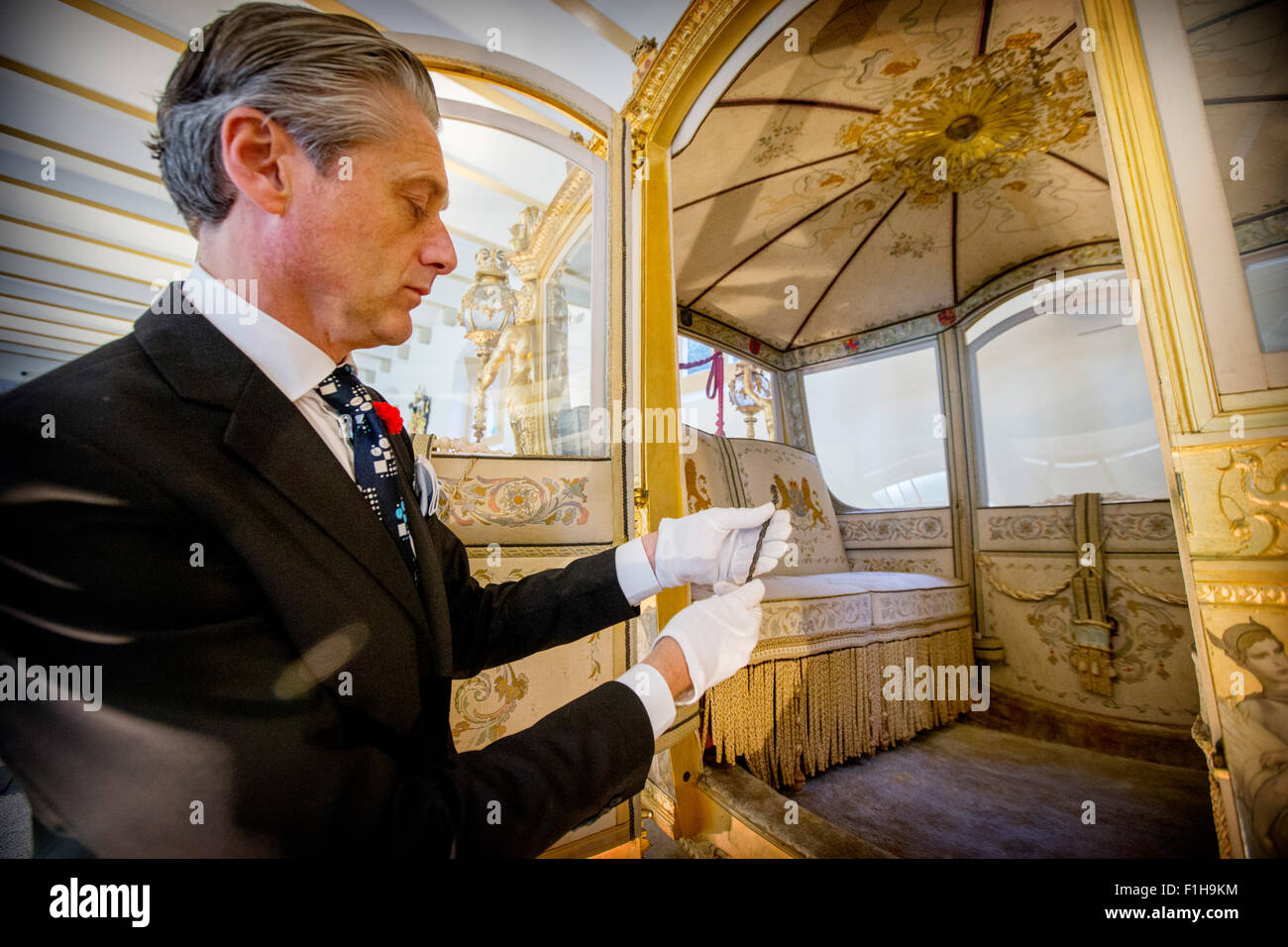 Apeldoorn, The Netherlands. 27th Aug, 2015. Conservator Paul Rem holds ...