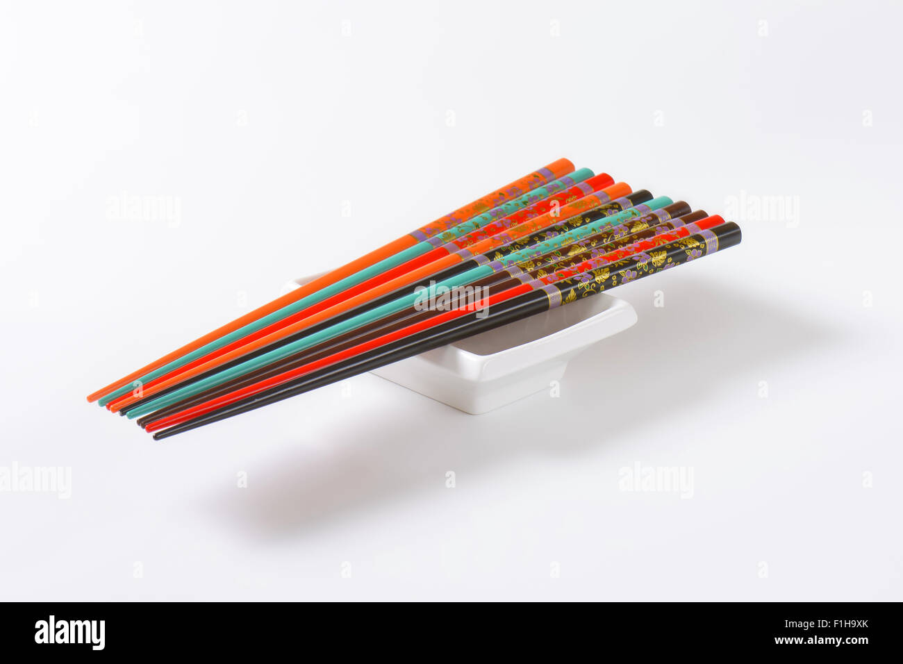 set of colorful chopsticks on white background Stock Photo - Alamy