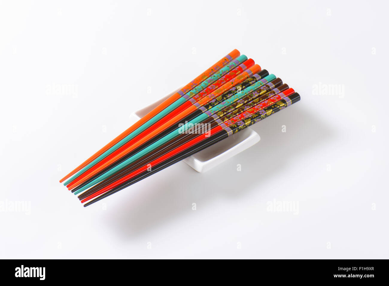set of colorful chopsticks on white background Stock Photo - Alamy
