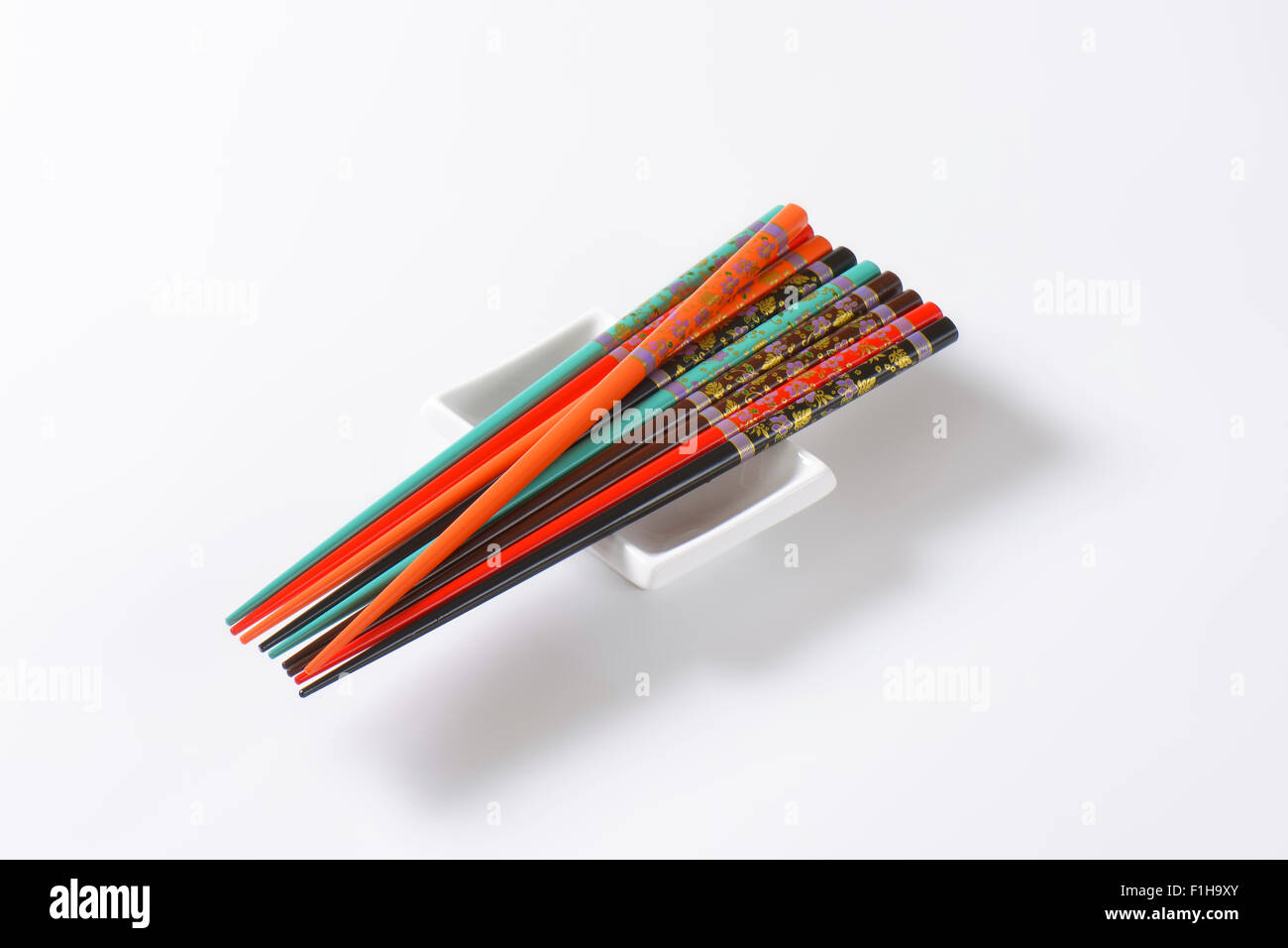 set of colorful chopsticks on white background Stock Photo - Alamy