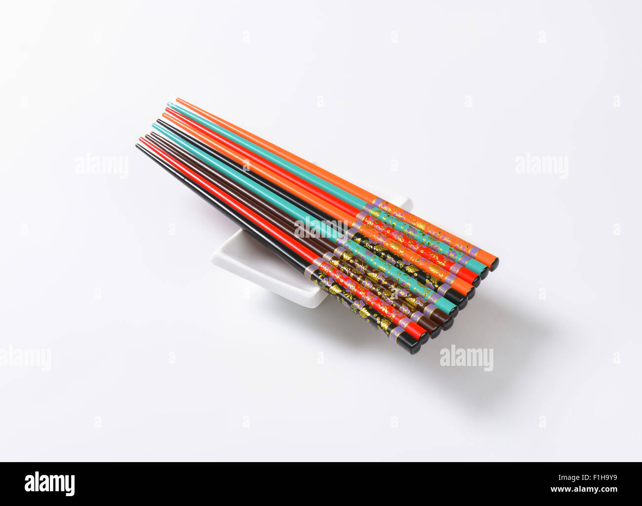 set of colorful chopsticks on white background Stock Photo - Alamy