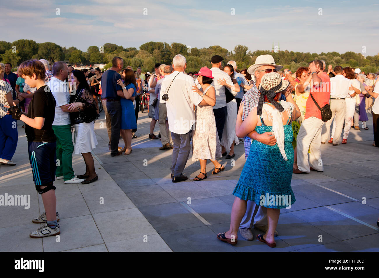 People dancing at show gig with live music of Janek Mlynarski and ...
