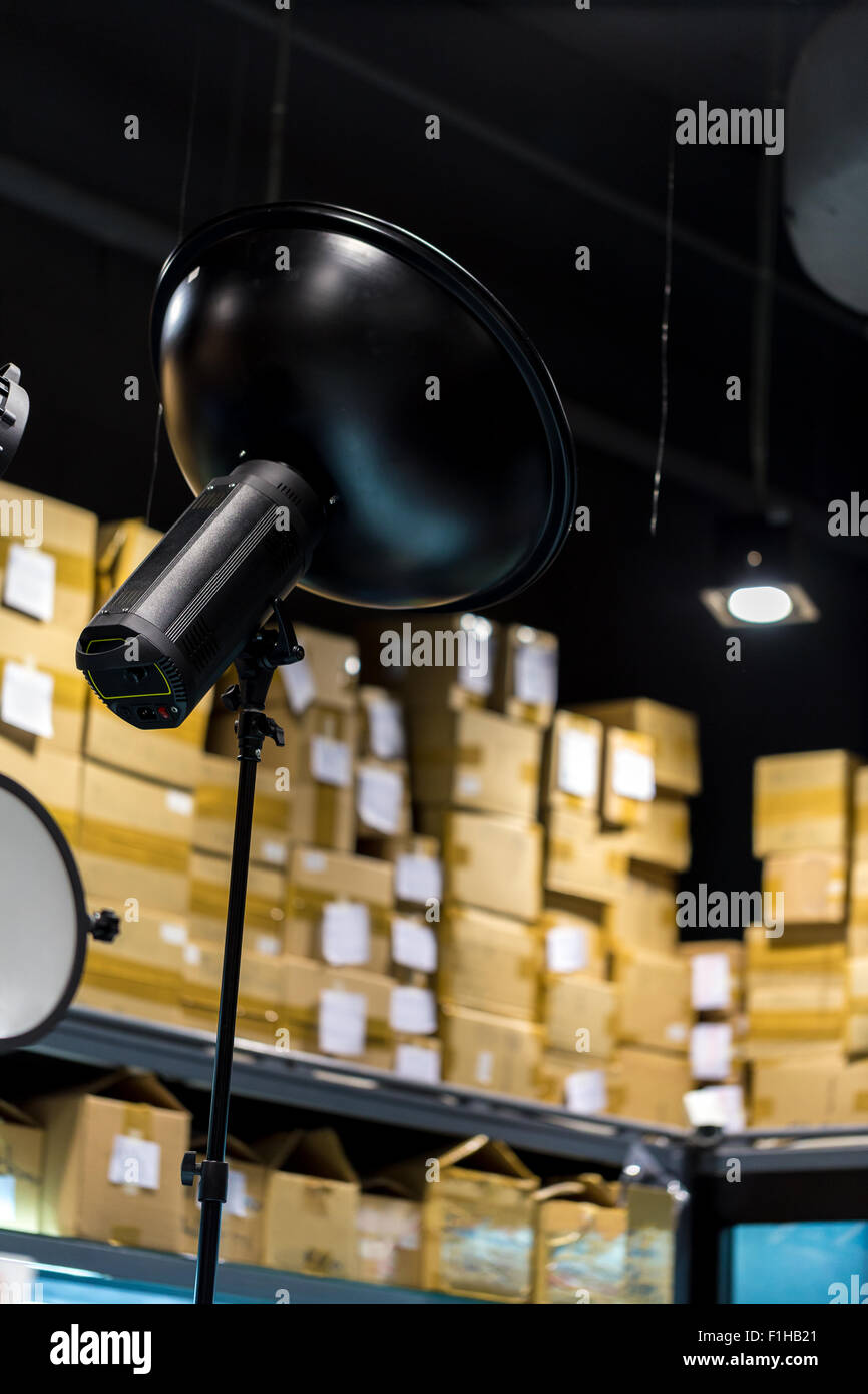 Studio strobe light with background of busy photography studio Stock ...