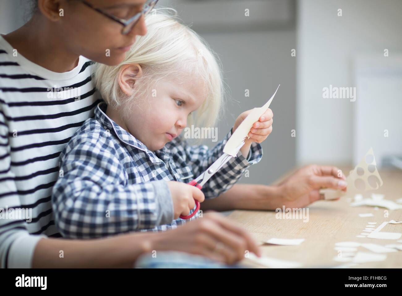 Boy cutting paper hi-res stock photography and images - Alamy