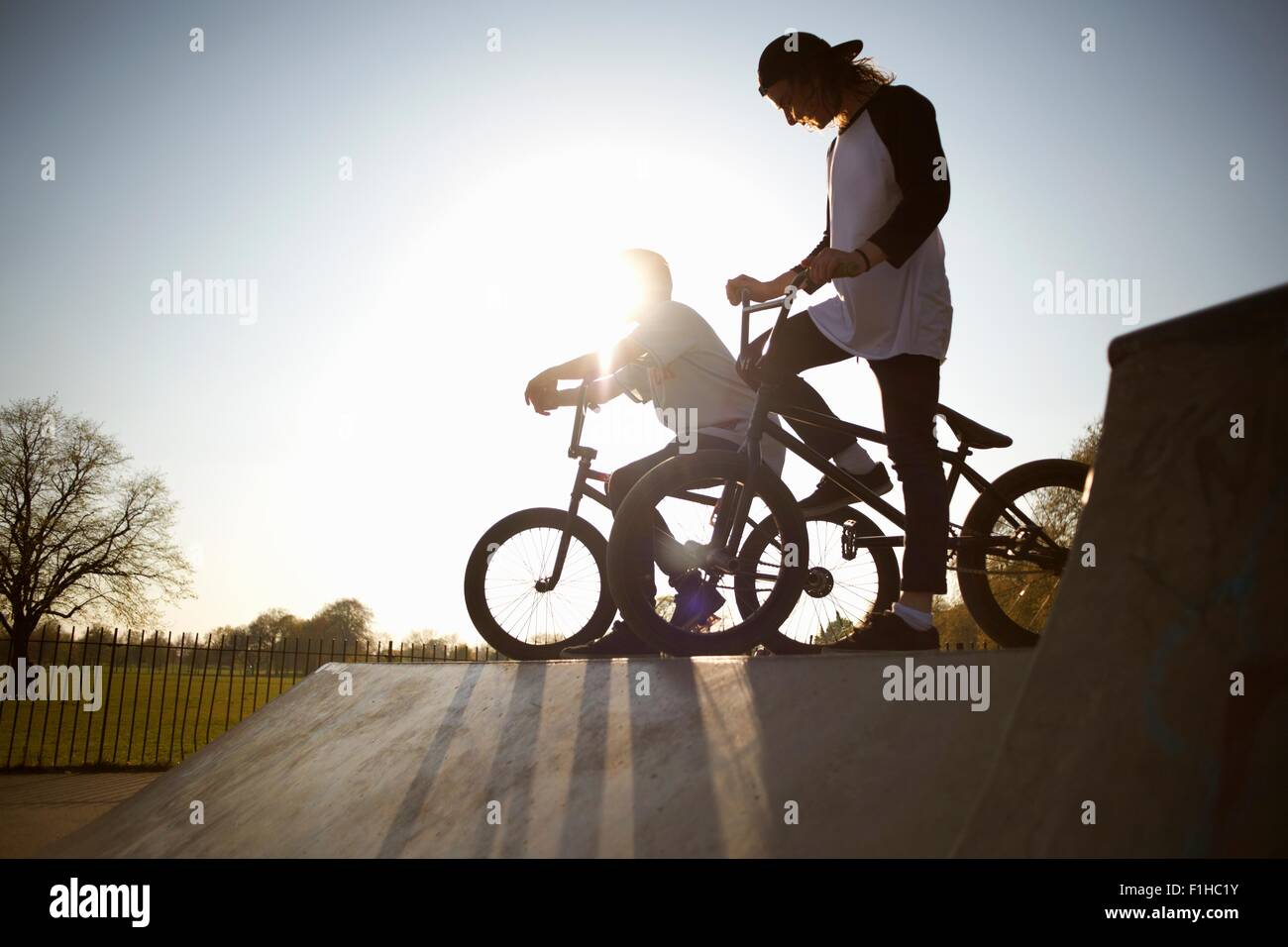 Young man sitting on bmx hi-res stock photography and images - Alamy