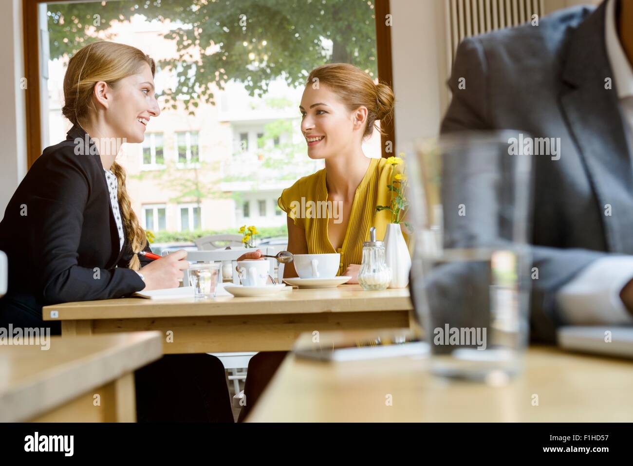 Two woman chatting in the water hi-res stock photography and images - Alamy