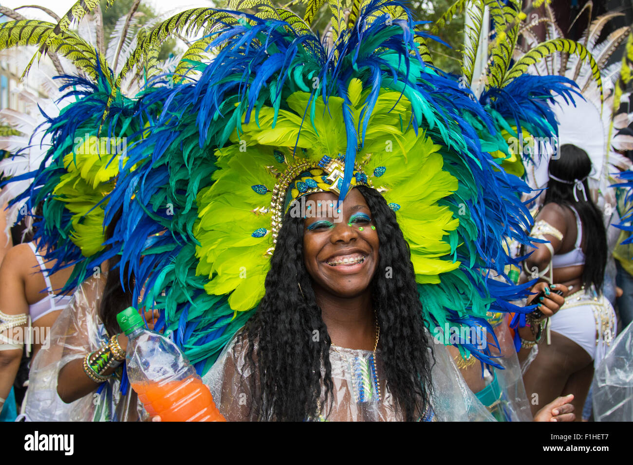 London, August 31st 2015. Revellers ignore the inclement weather to ...