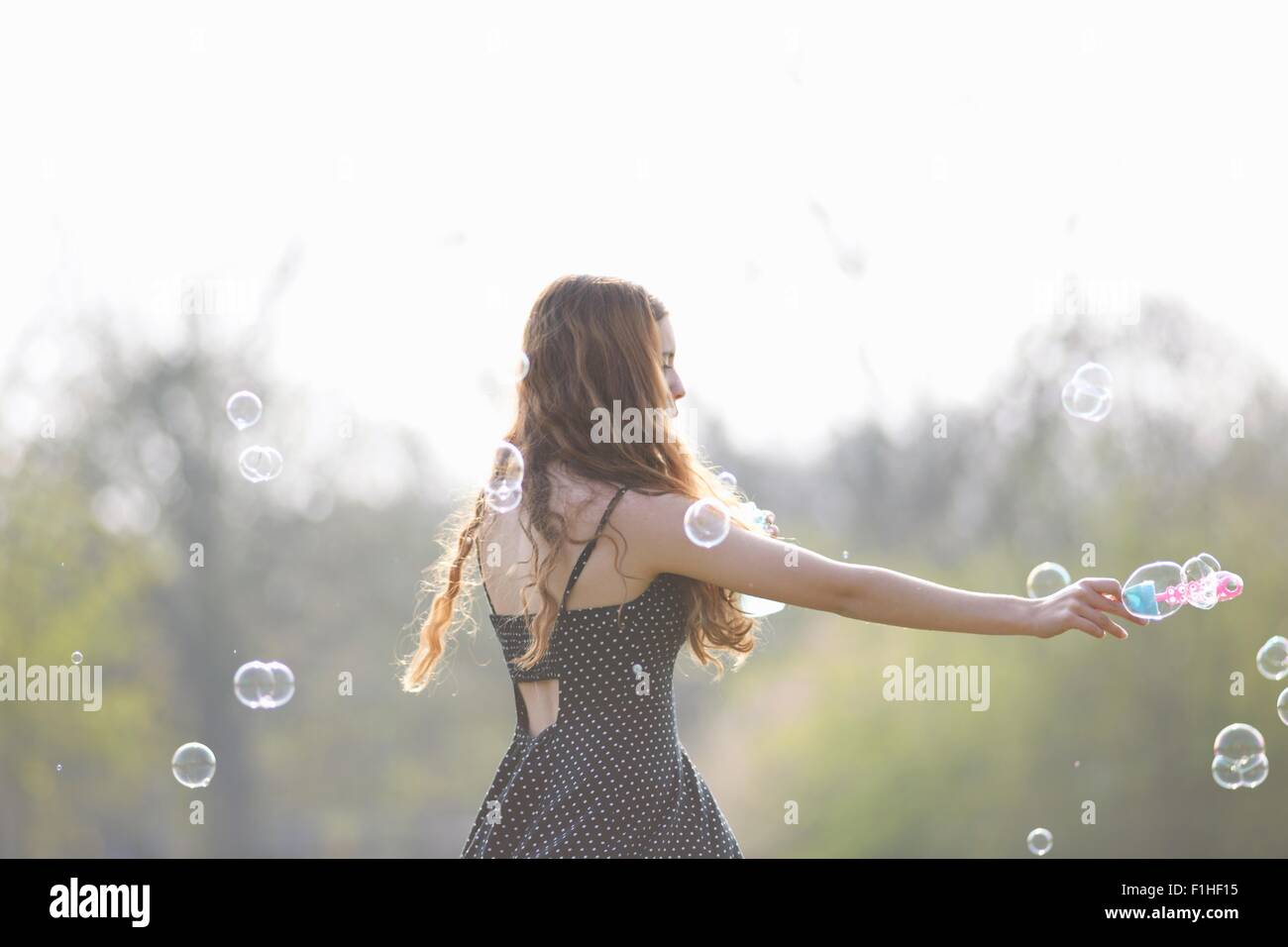 Bubble blowing side view hi-res stock photography and images - Alamy