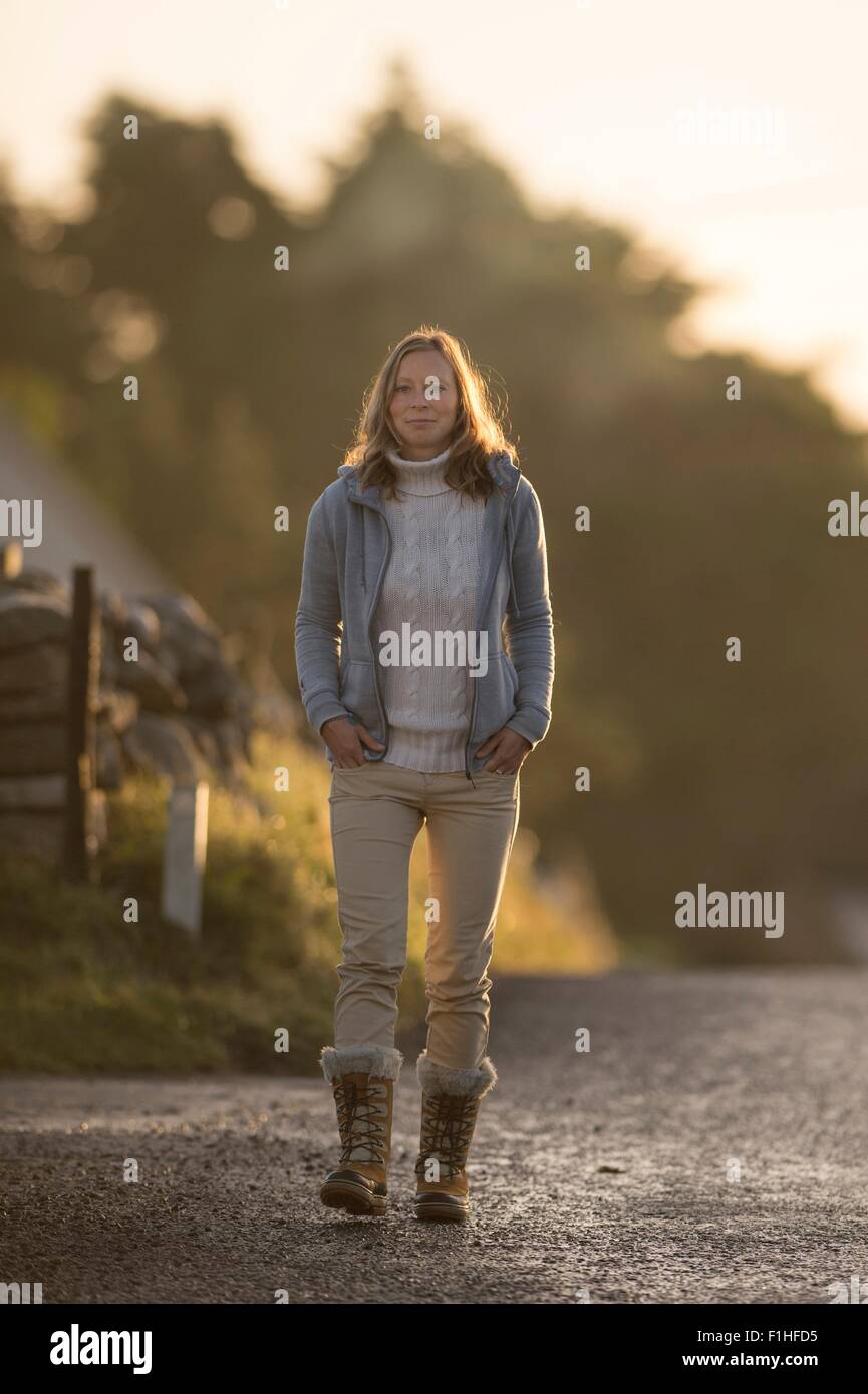 Walking along road hi-res stock photography and images - Alamy