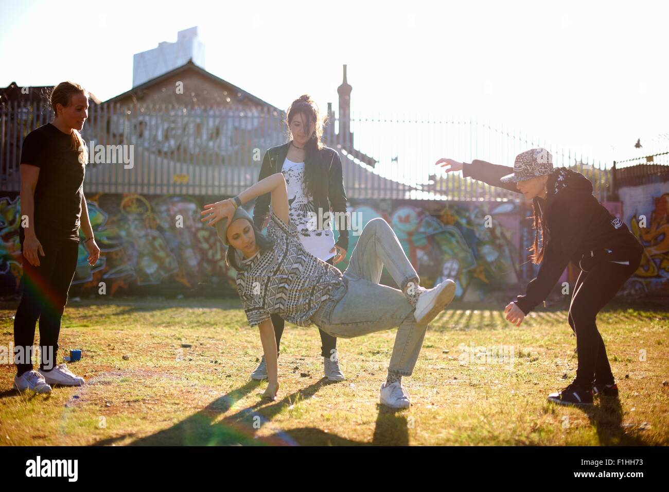 Young woman in breakdancing freeze Stock Photo - Alamy