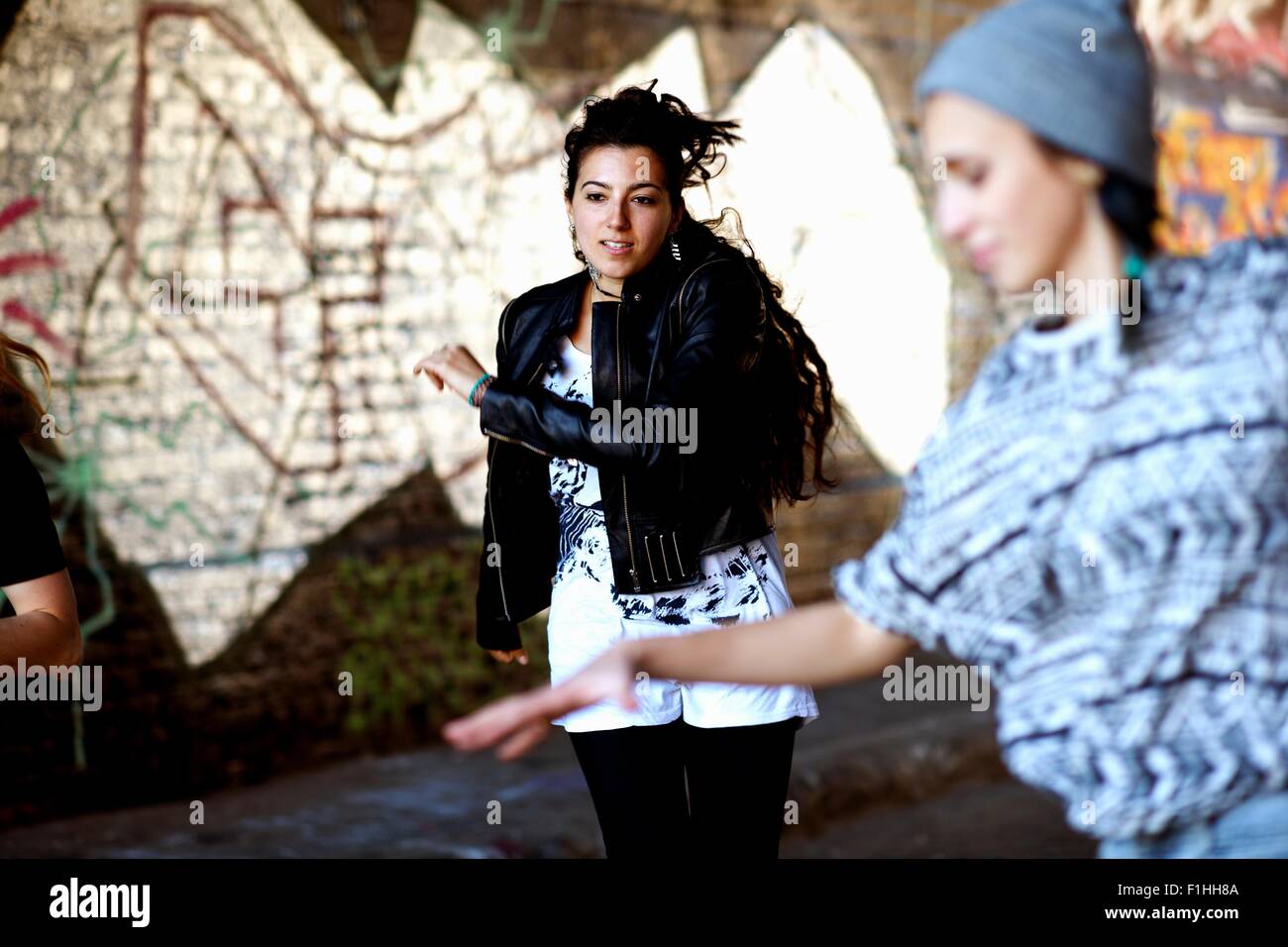 Young women dancing in the street Stock Photo - Alamy