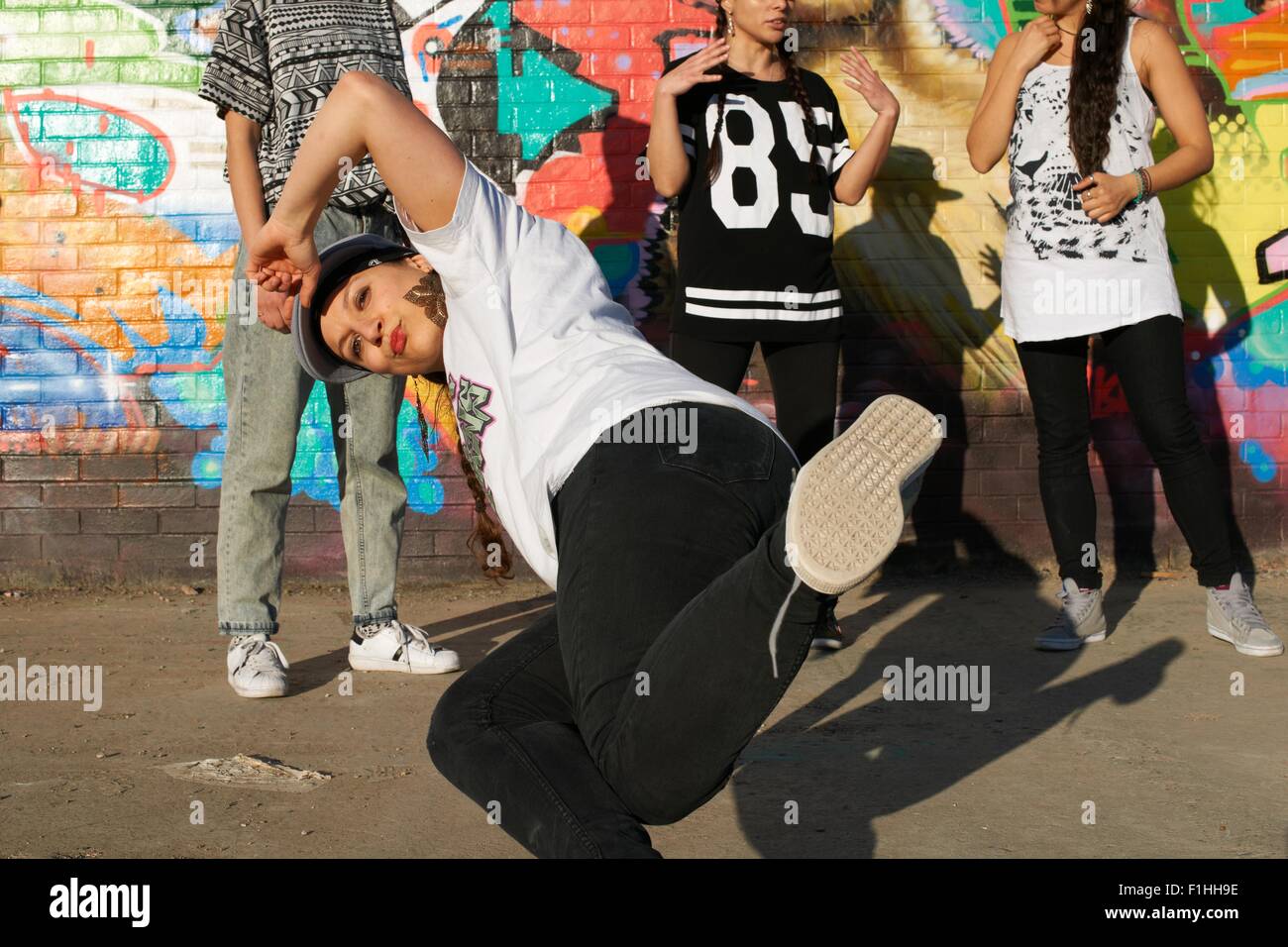 Young women in breakdancing freeze Stock Photo - Alamy