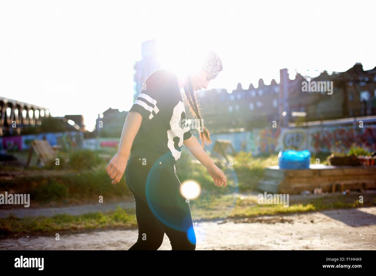 Young women dancing in the sunlight, backlit Stock Photo - Alamy