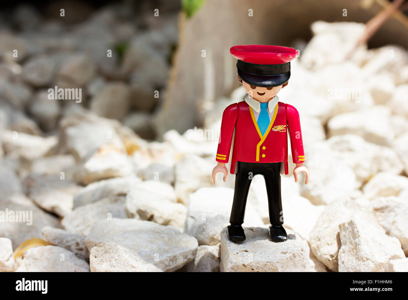 Miniature plastic toy. Man in the form of a passenger plane pilot Stock ...