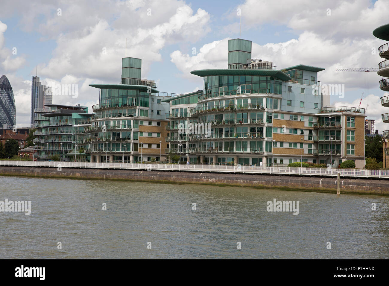 Riverside apartments and office buildings as seen from the River Thames ...
