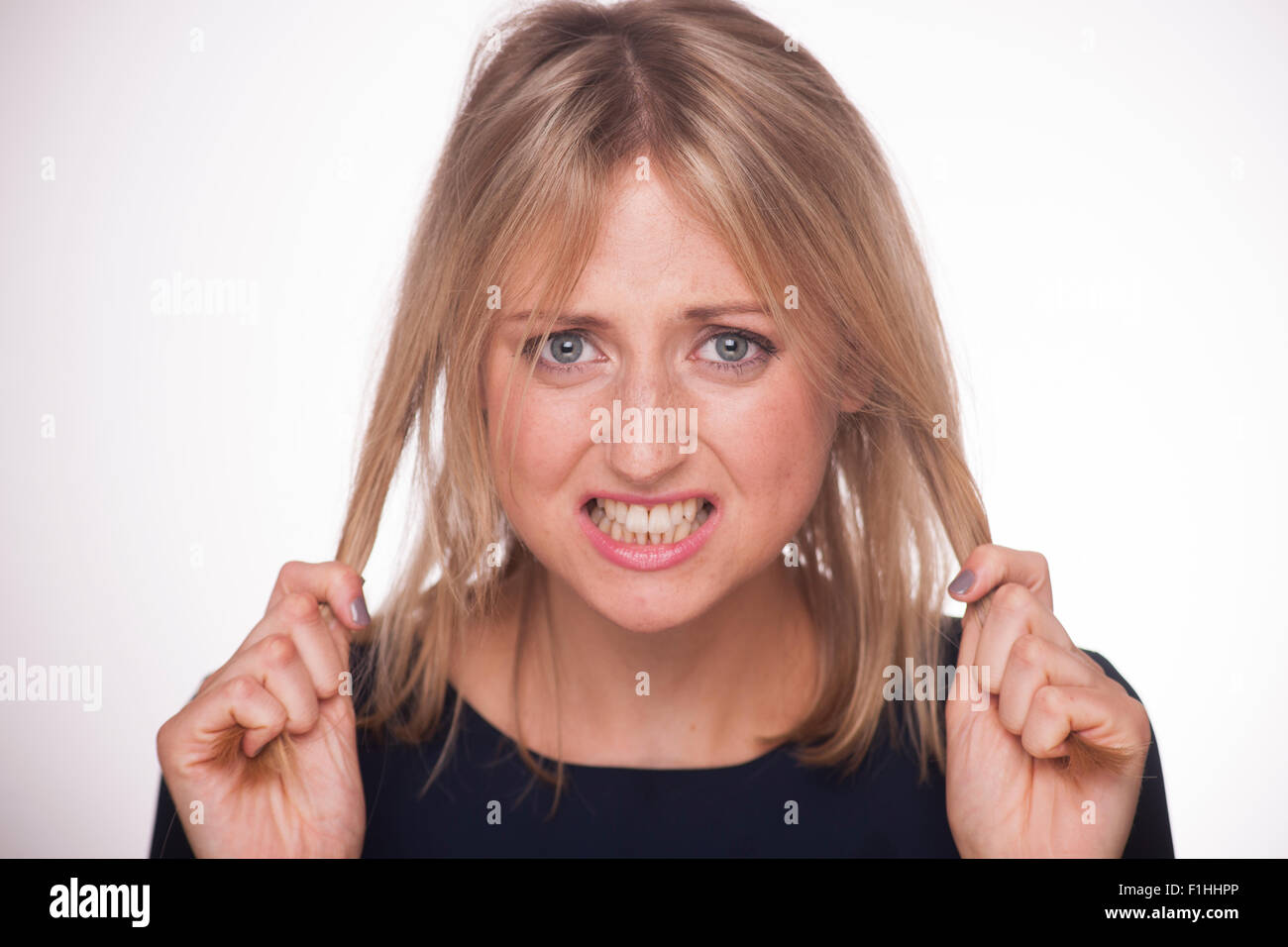 Frustration woman frustrated pulling hair hi-res stock photography and ...