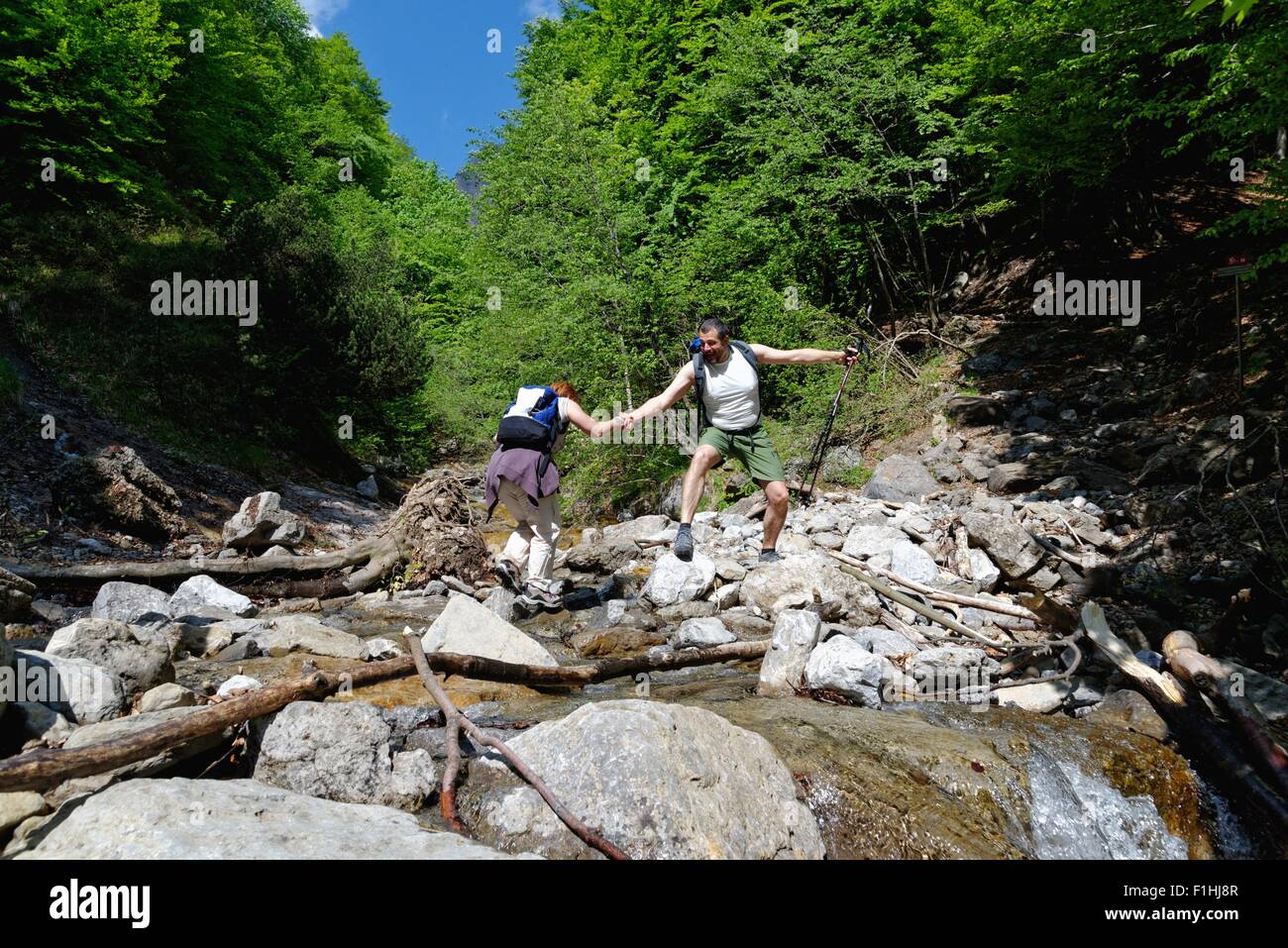 Two People Crossing High Resolution Stock Photography and Images - Alamy