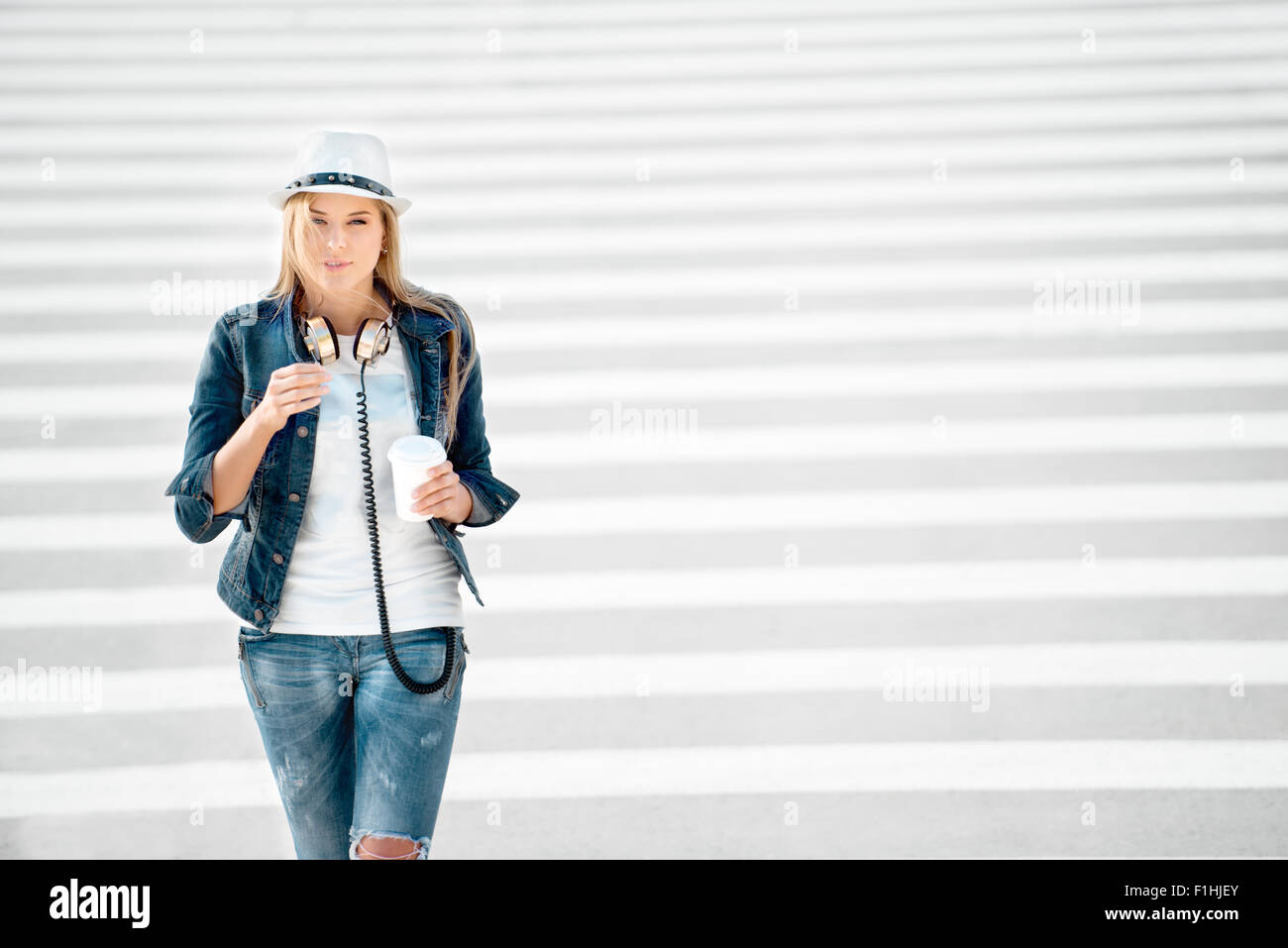 Walking on zebra cross Stock Photo - Alamy