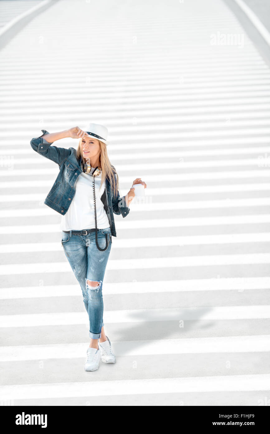 Walking on zebra cross Stock Photo - Alamy