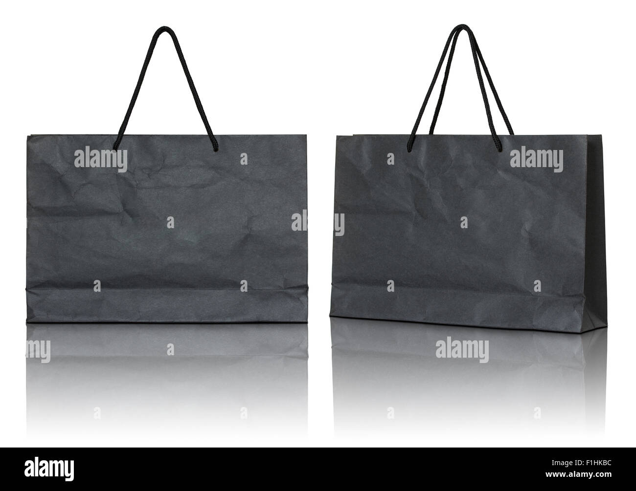 black paper bag isolated on white background Stock Photo - Alamy