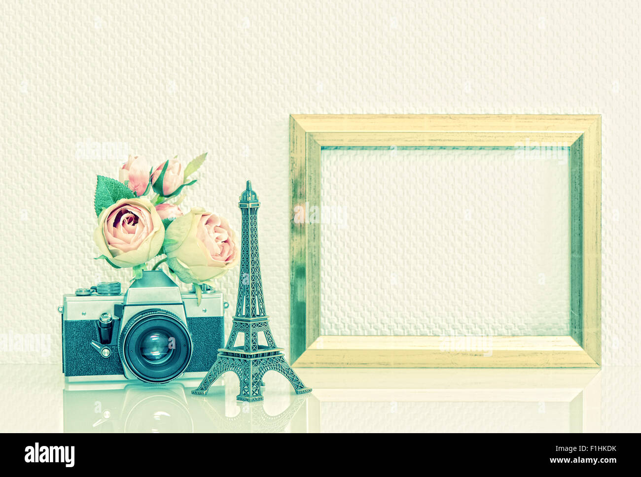 Golden picture frame, rose flowers and no name vintage camera Stock ...