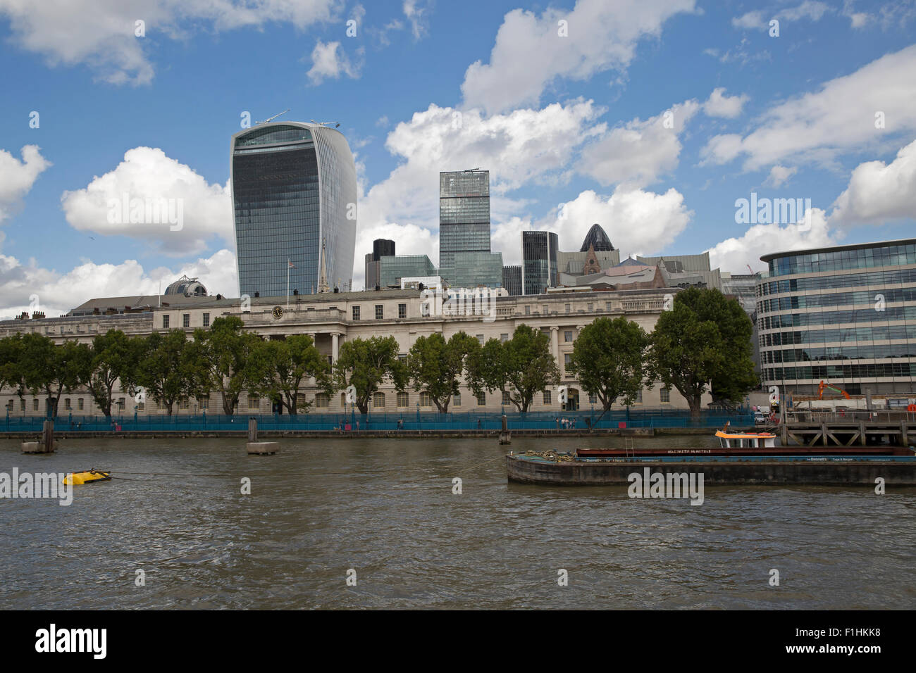 Riverside apartments and office buildings as seen from the River Thames ...