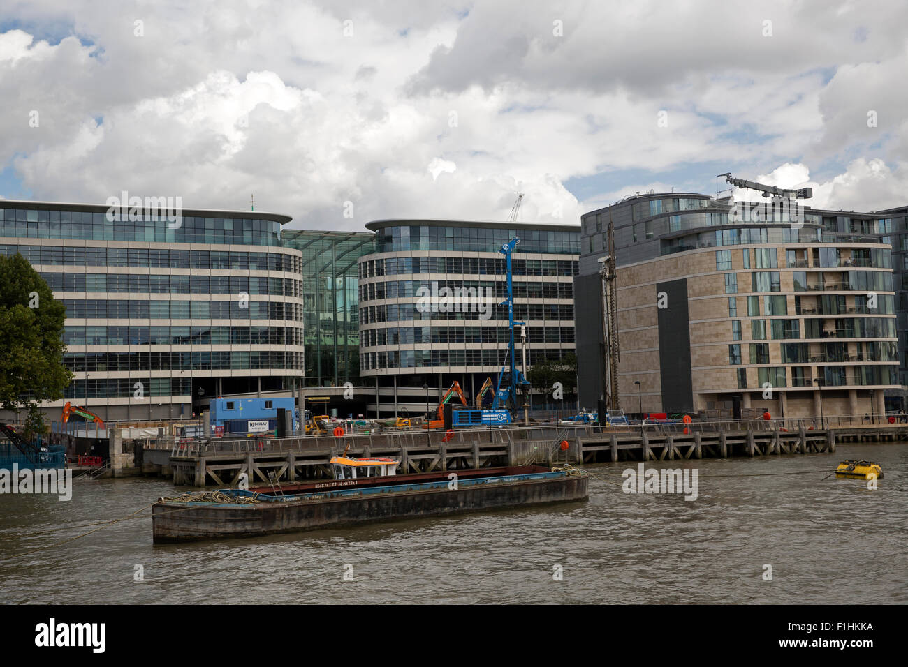 Riverside apartments and office buildings as seen from the River Thames ...