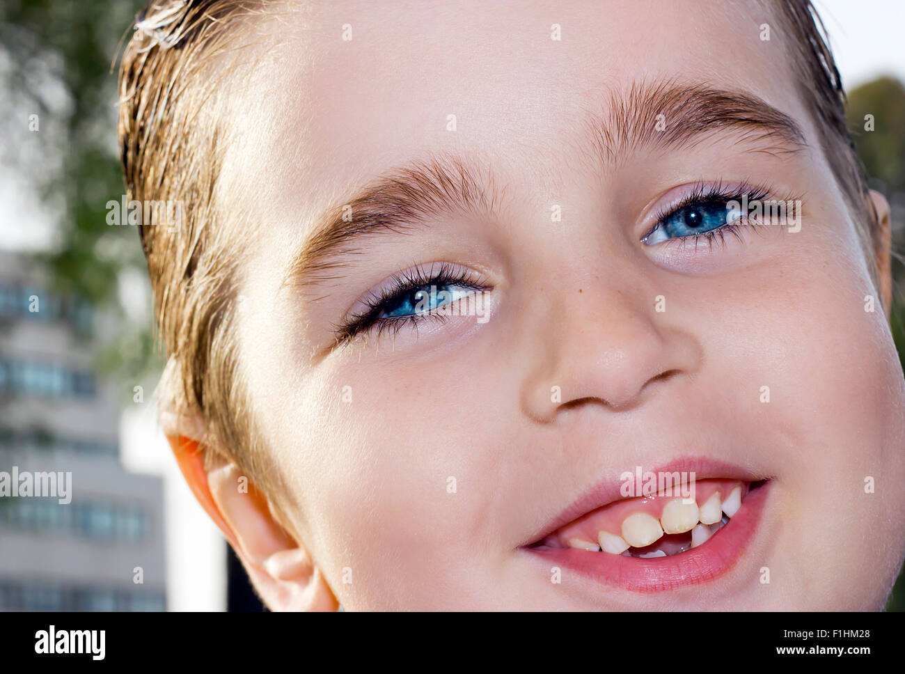 Blonde boy smiling hi-res stock photography and images - Alamy