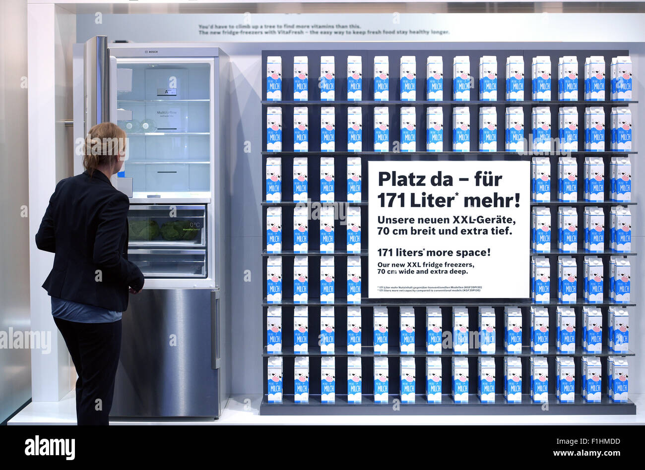 Berlin, Germany. 2nd Sep, 2015. A woman opens a big refrigerator at the ...