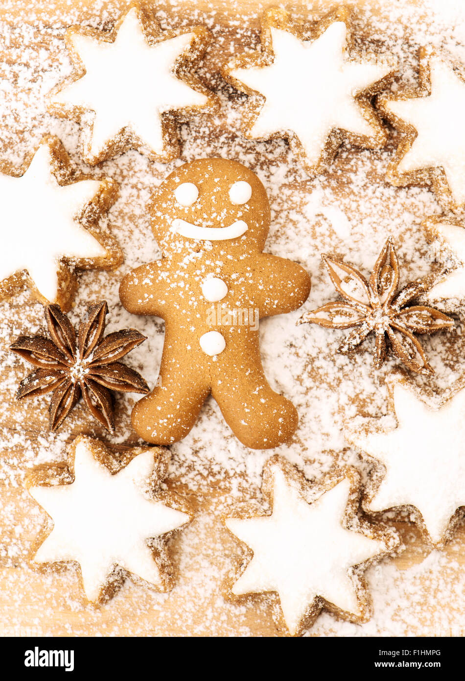Christmas bakery. Gingerbread man cookie, cinnamon stars and star anise ...