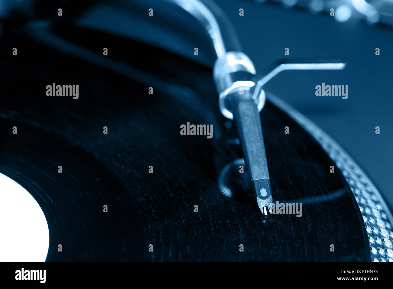 dj stylus on record. spinning turntable Stock Photo - Alamy